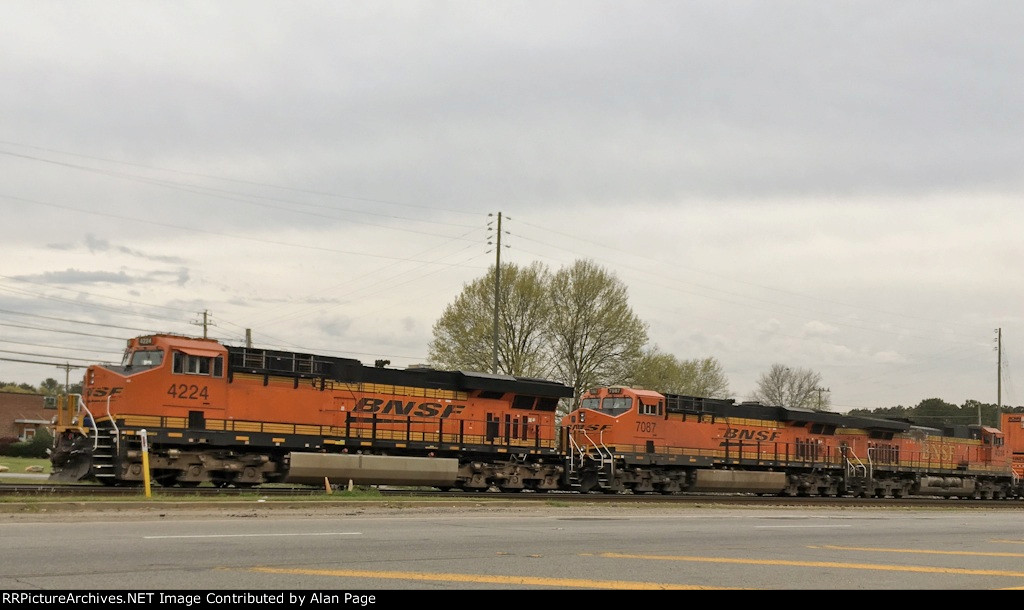 BNSF 4224 leads a trio of units waiting for green